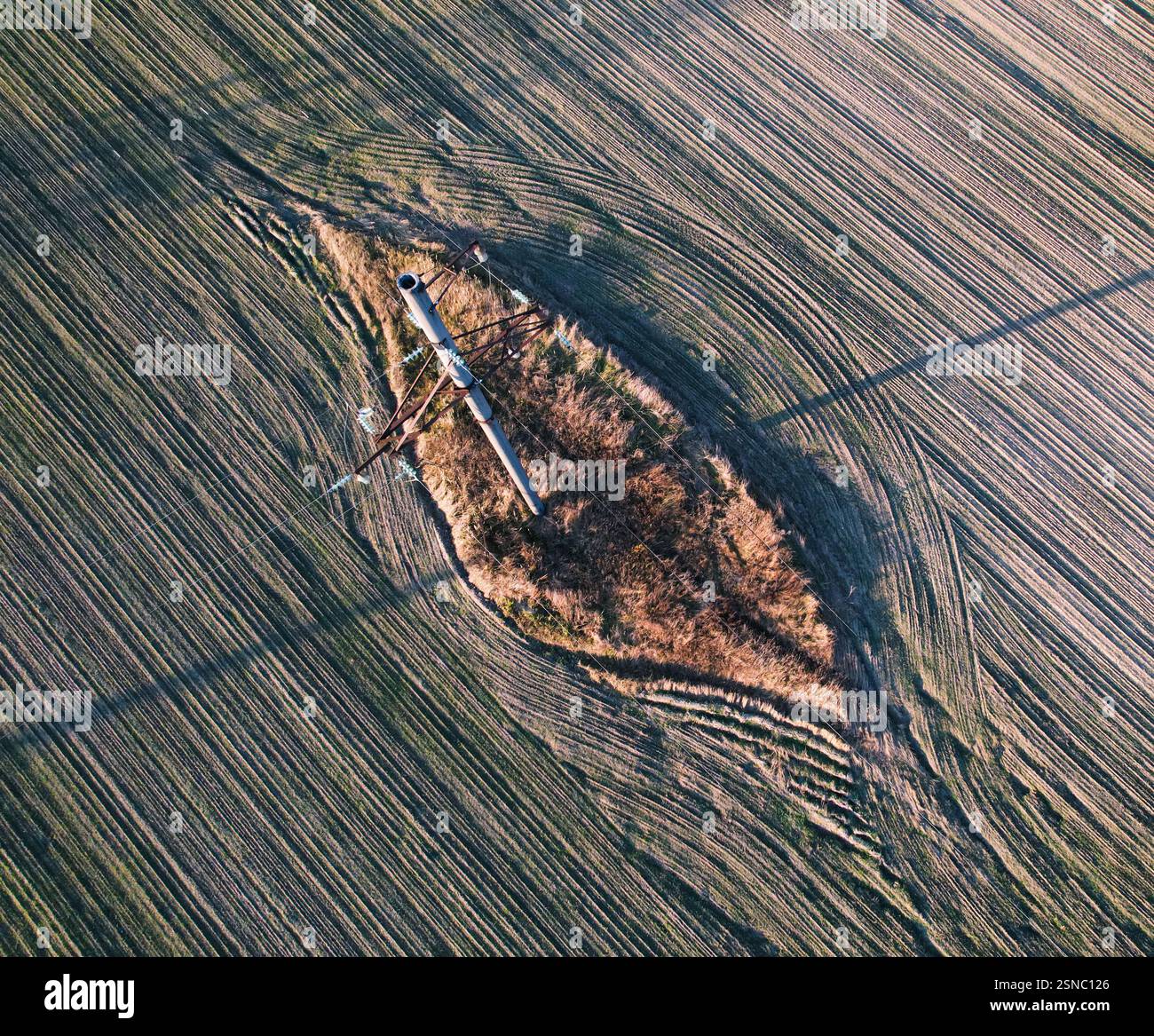 An aerial view shows a significant hole in a field Stock Photo - Alamy