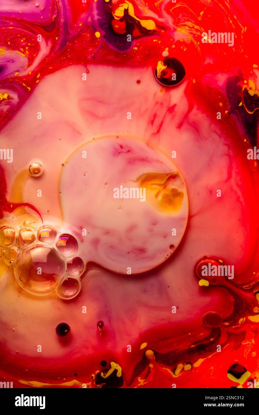 Stunning creative macro abstract still-life of colour infused milk and ...