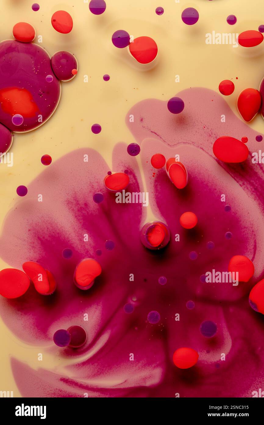 Stunning creative macro abstract still-life of colour infused milk and ...