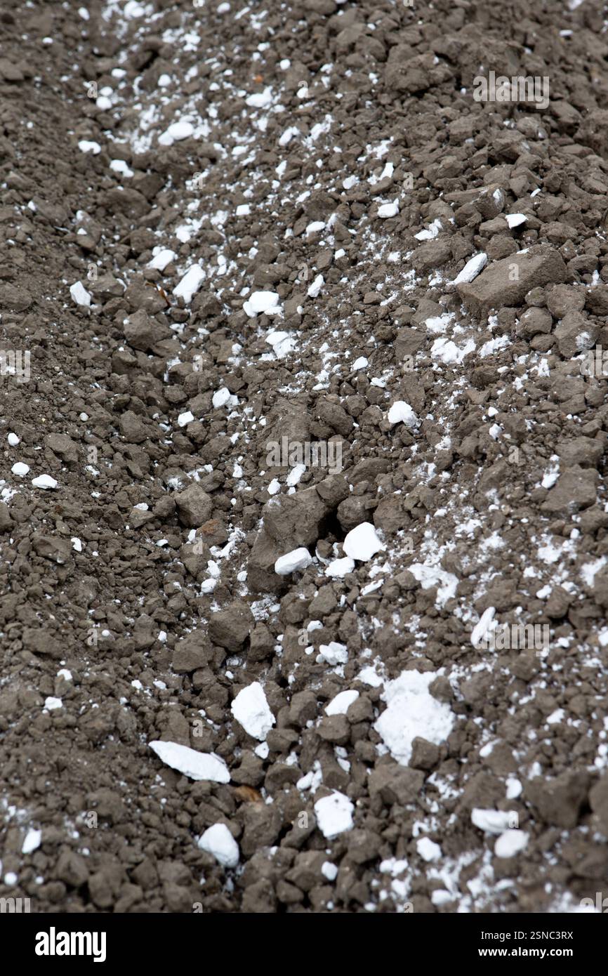 Tractor spraying fertilizer on a field. Chalk spraying. Fertilizer. Agricultural business Stock ...