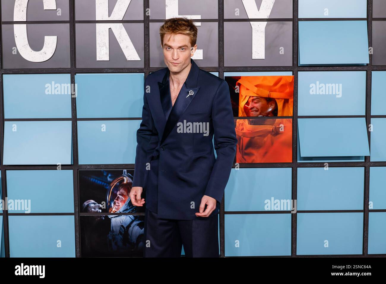 Robert Pattinson poses for photographers upon arrival at the World ...