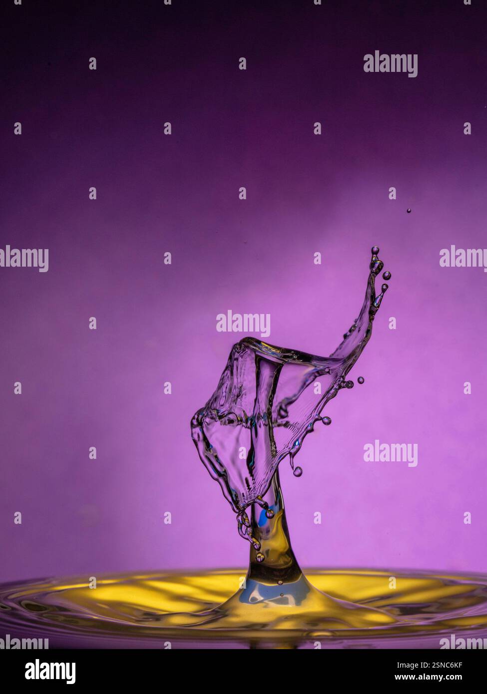 Arresting, ethereal, colour infused, imaginative water collision, macro ...