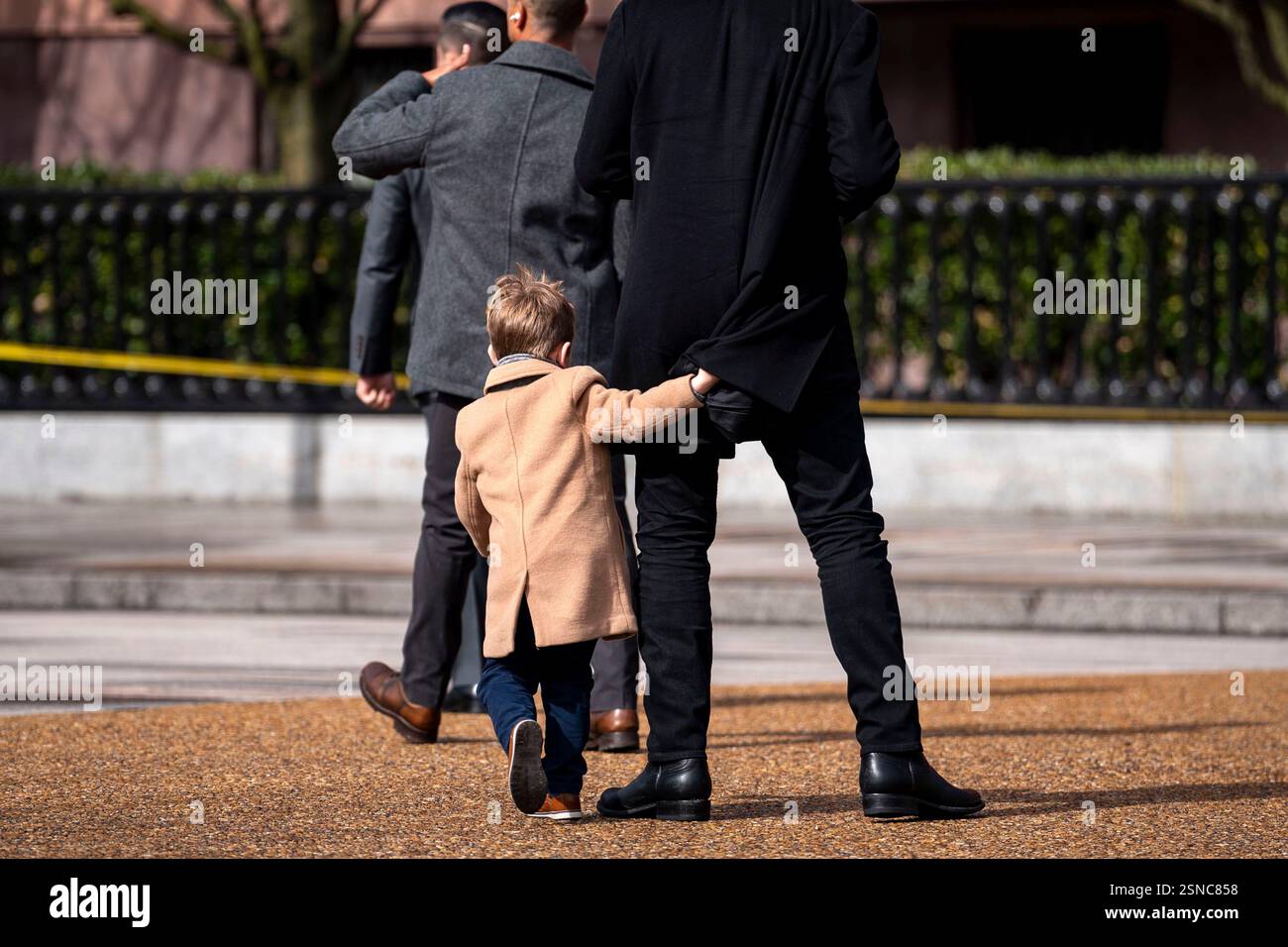 Washington, United States. 13th Feb, 2025. X Musk runs around the legs ...