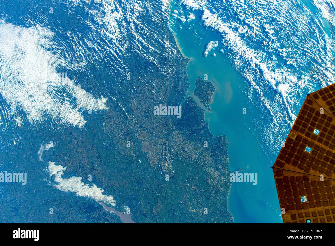 Land and coastline features. Digital enhancement of an image by NASA ...