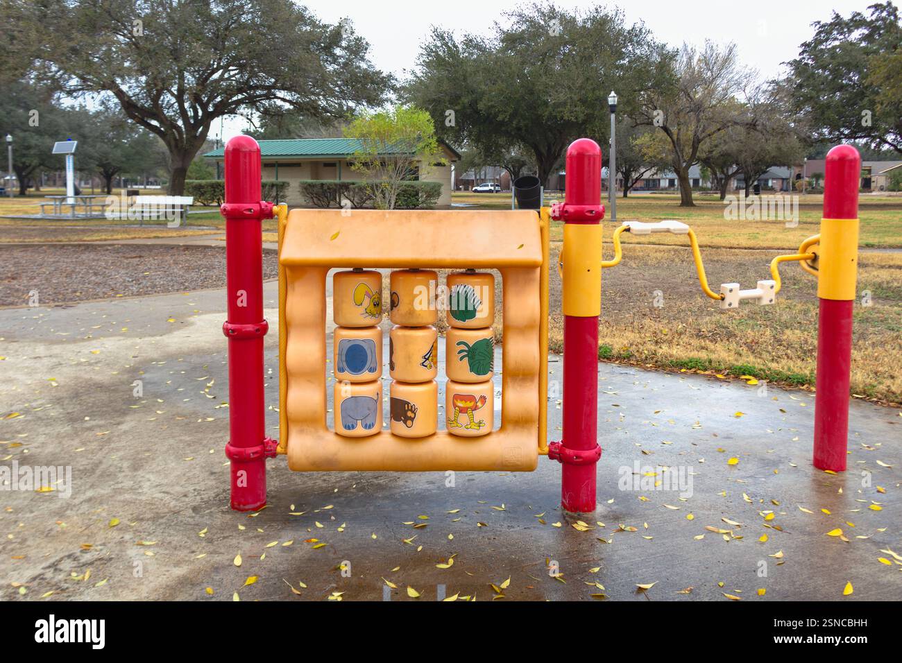 Playground equipment with spinning cylinders to mix and match animals ...