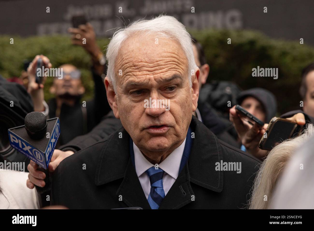 New York City Council member Robert Holden speaks to the members of the ...