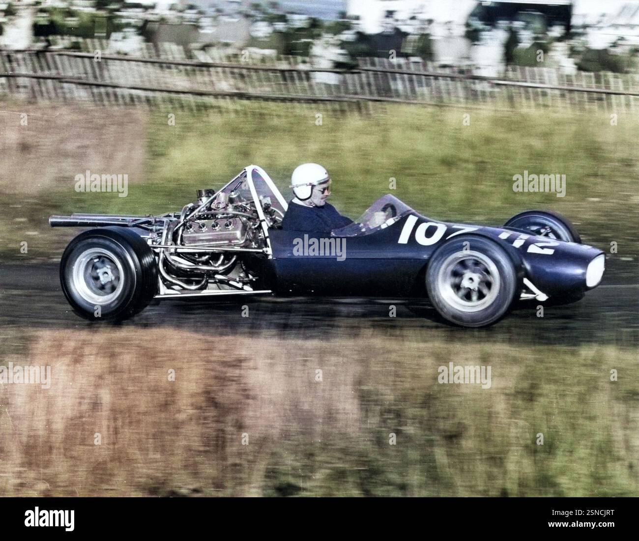 Man driving V8 powered single seater racing car at Loton Park Hill ...