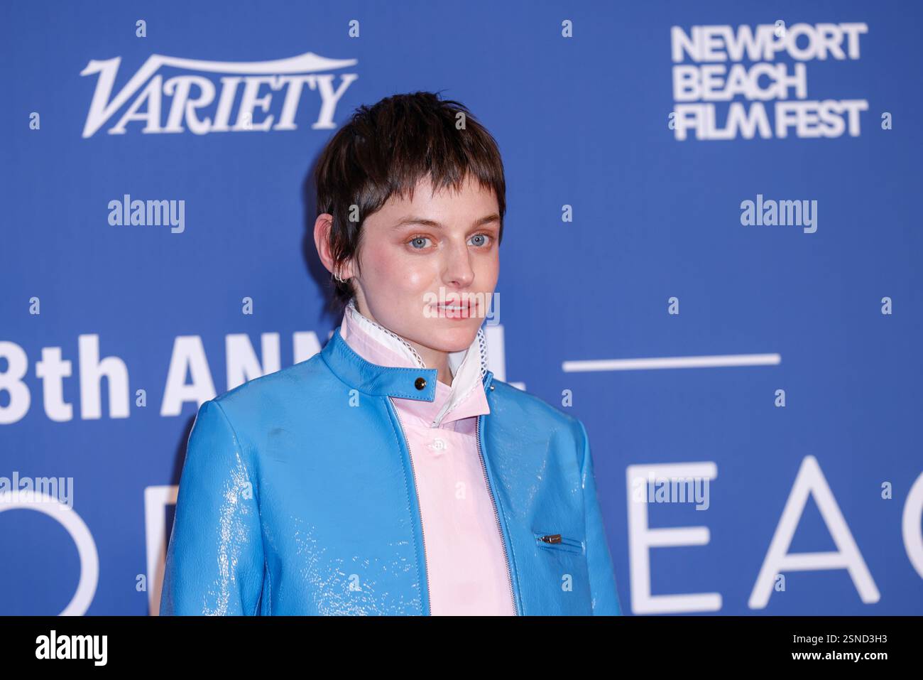 Emma Corrin poses for photographers upon arrival at the Newport Beach ...
