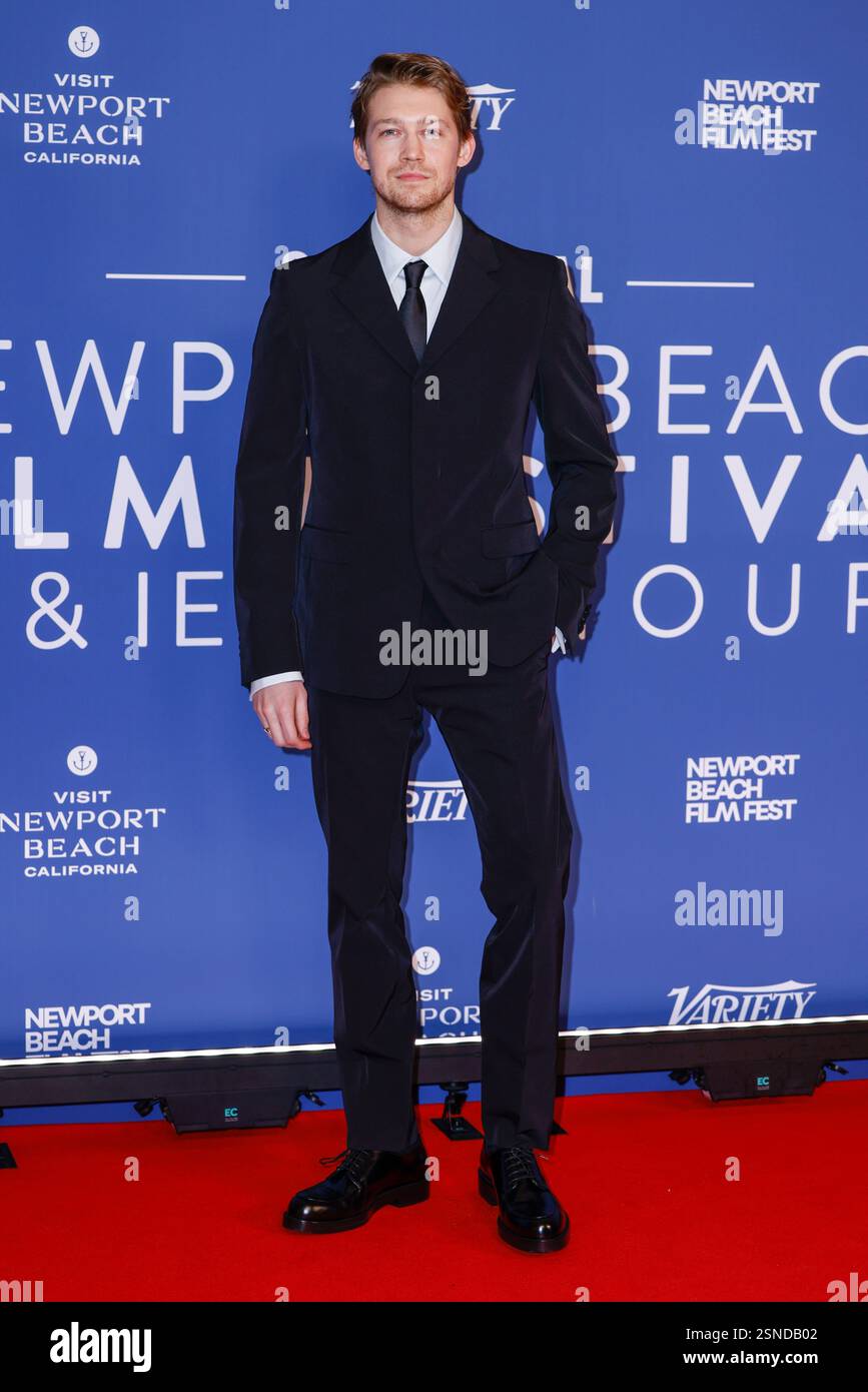 Joe Alwyn poses for photographers upon arrival at the Newport Beach ...