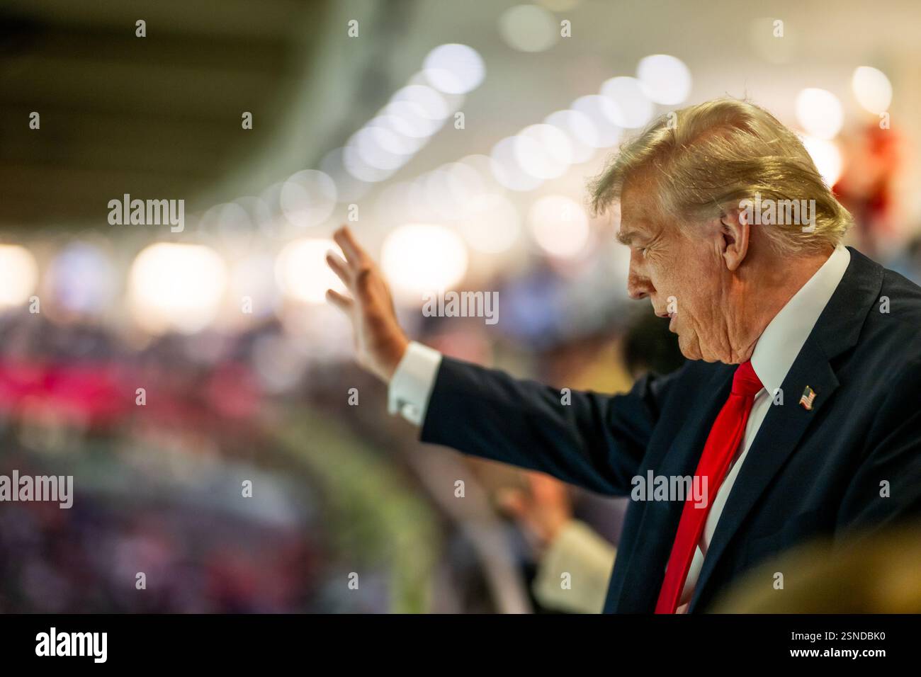 President Donald J. Trump attends Superbowl LIX between the ...