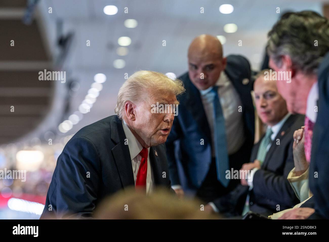 President Donald J. Trump attends Superbowl LIX between the ...