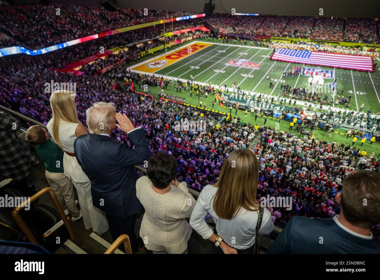 President Donald J. Trump attends Superbowl LIX between the ...