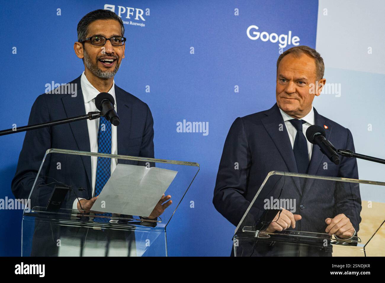Google CEO Sundar Pichai addresses the press conference from behind the ...