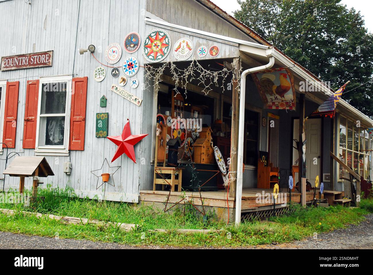 An antique shop is decorated with Amish hex signs in Pennsylvania Stock ...