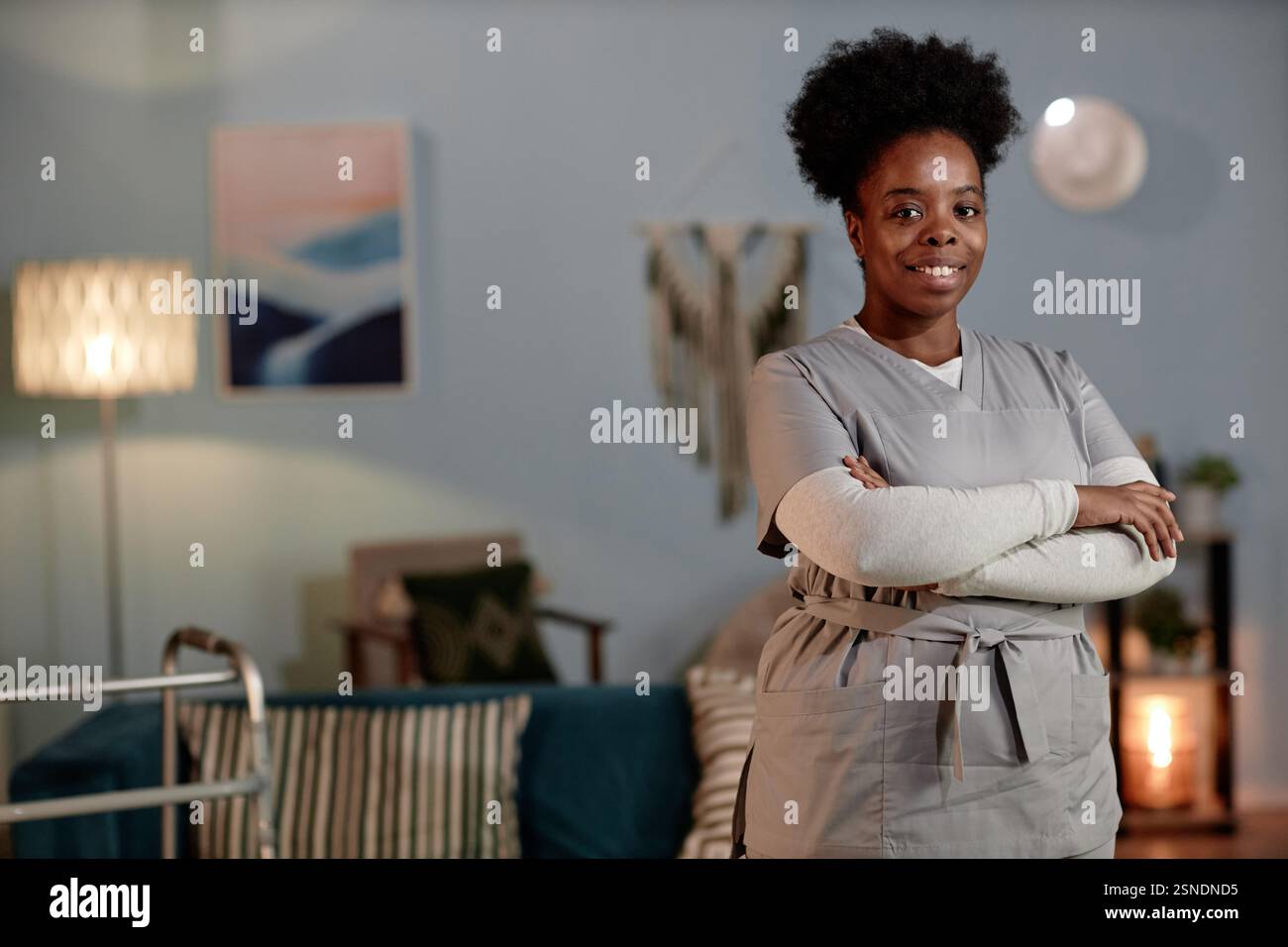 Medium full portrait of African American female social worker wearing ...