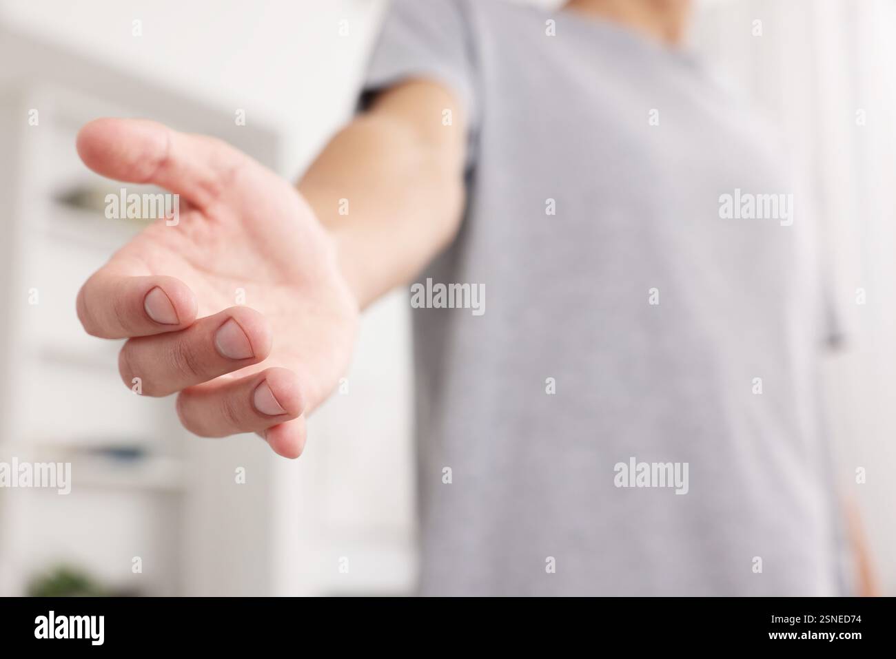 Offering help hi-res stock photography and images - Alamy