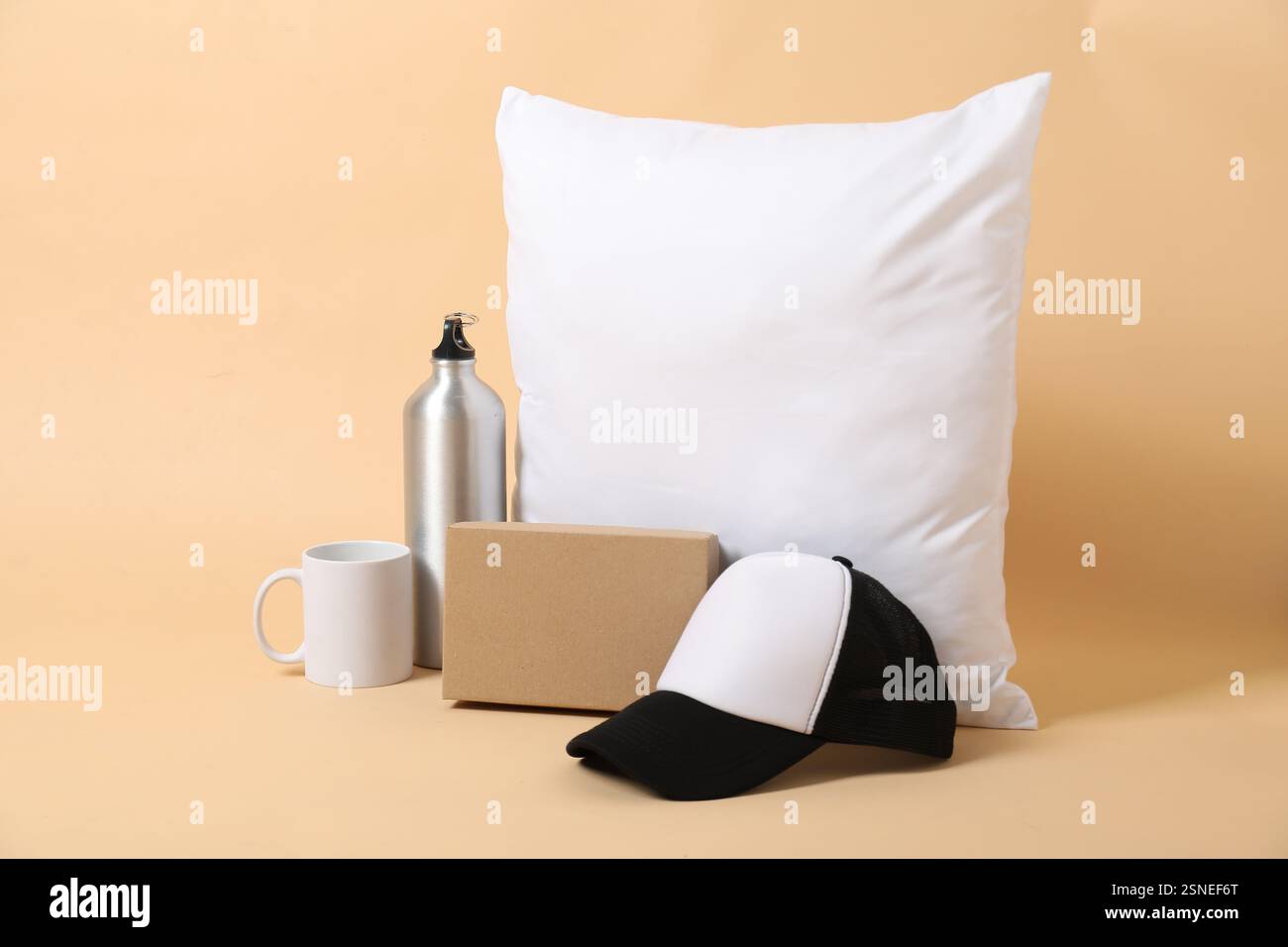 Different blank items for branding on beige background. Mockup for ...