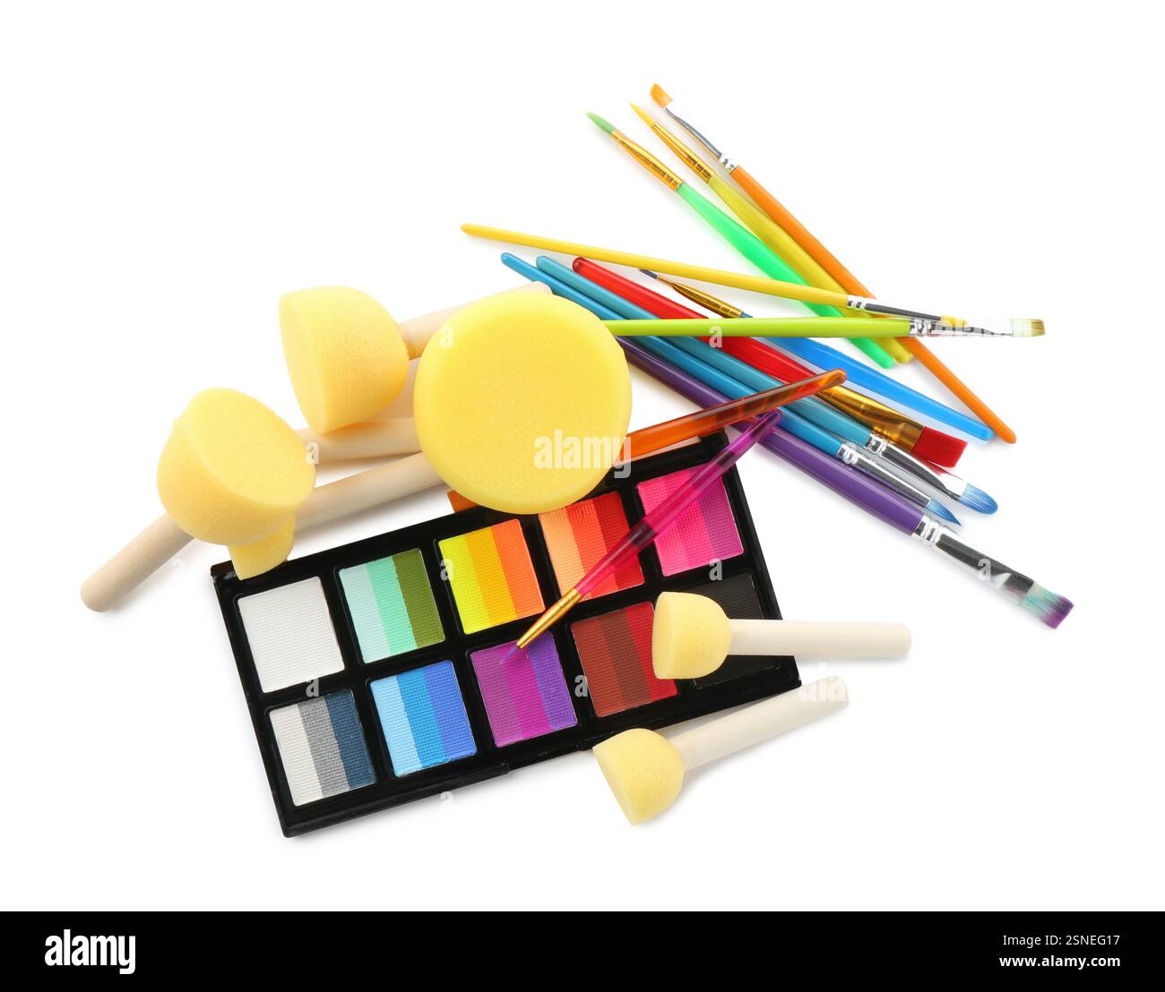 Bright face paint palette, brushes and sponges isolated on white, top ...