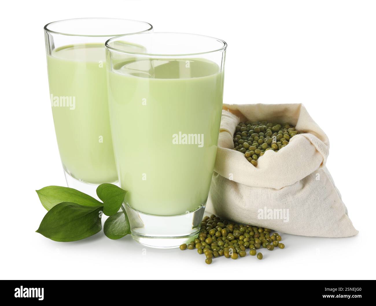 Fresh mung bean juice in glasses, seeds and green leaves isolated on ...