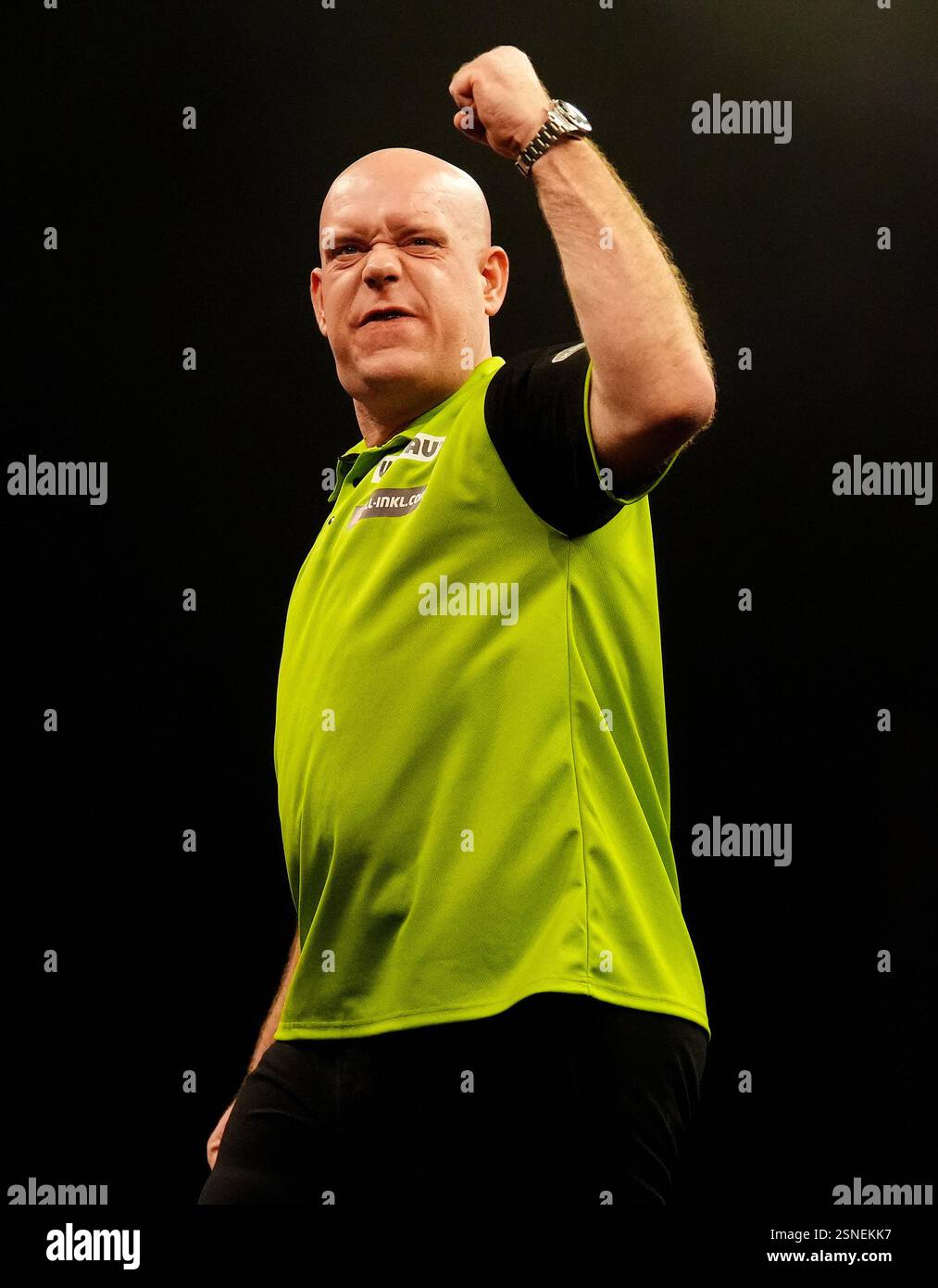 Michael van Gerwen celebrates winning his match against Stephen Bunting ...