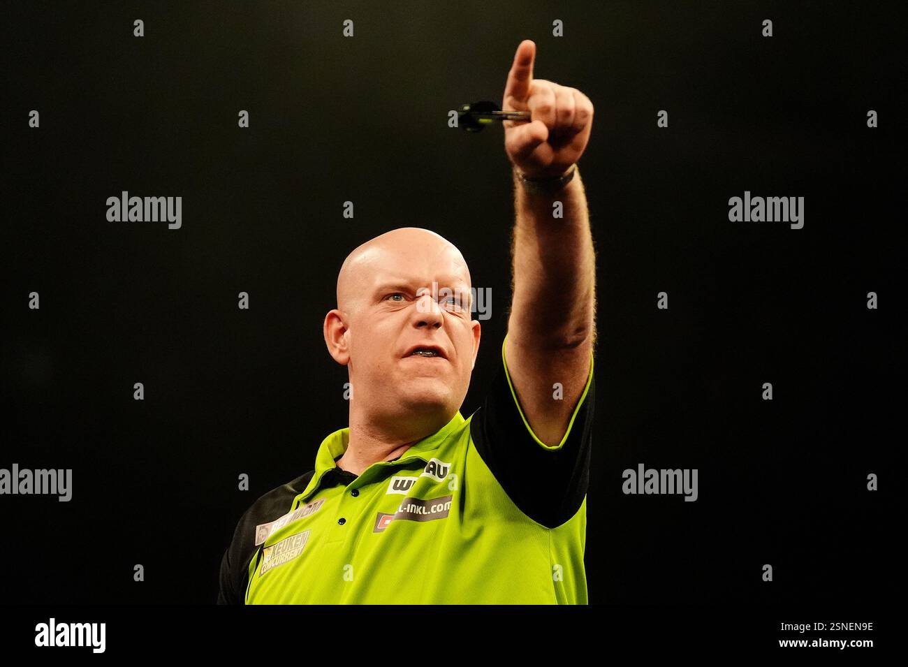 Michael van Gerwen celebrates winning his match against Stephen Bunting ...