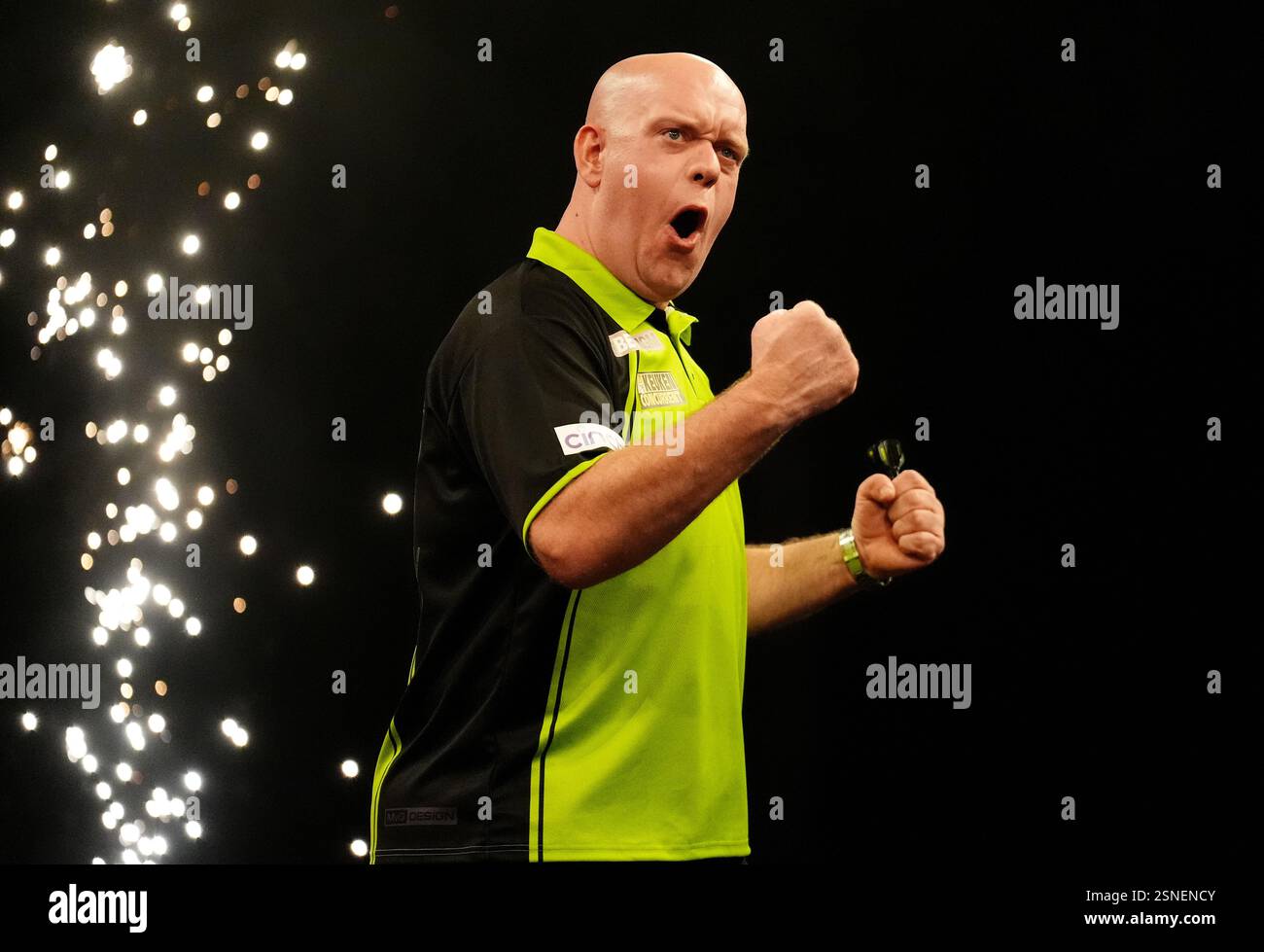 Michael van Gerwen celebrates winning his match against Stephen Bunting ...