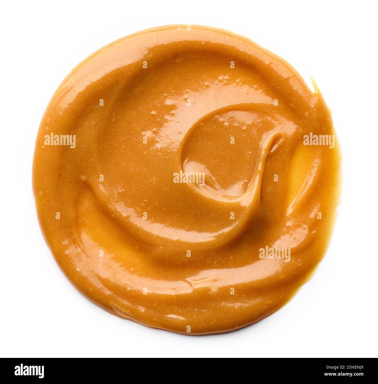Smear of tasty caramel paste on white background, top view Stock Photo ...