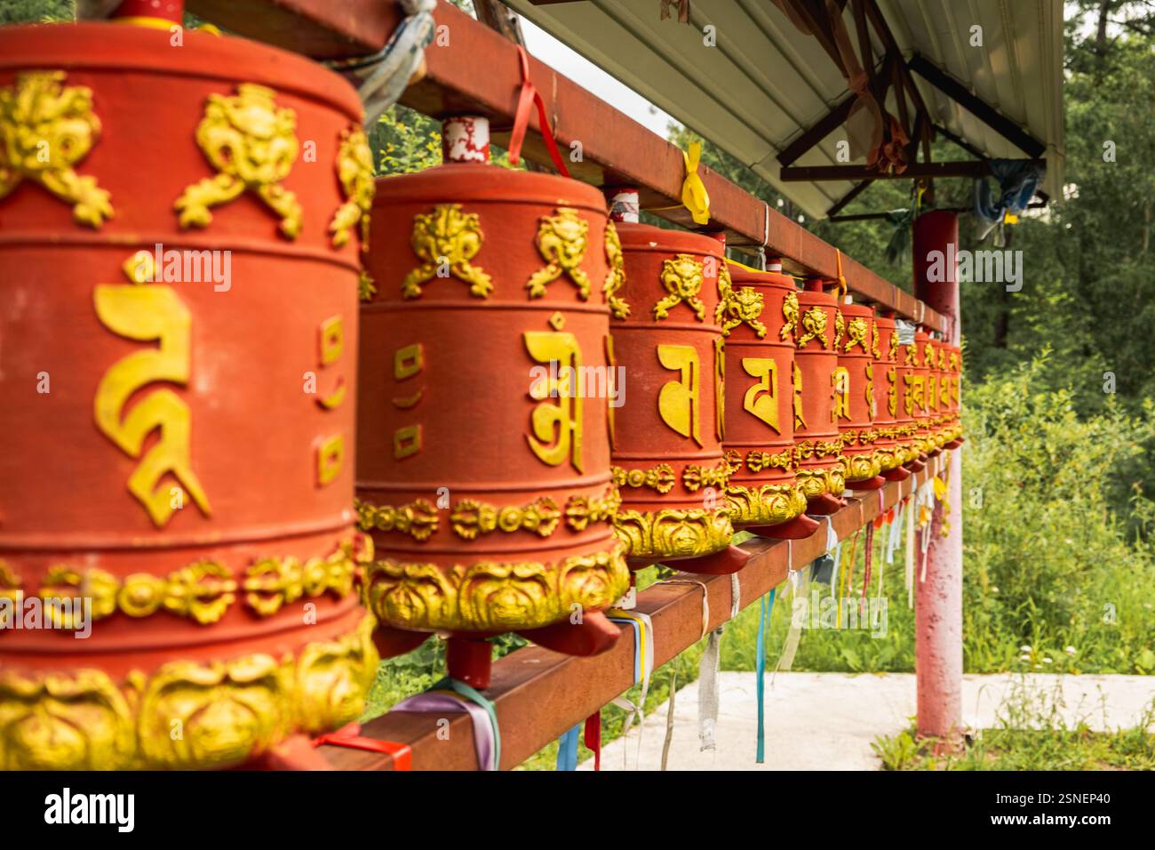 Rotating religious elements for touching turning spinning Buddhist ...