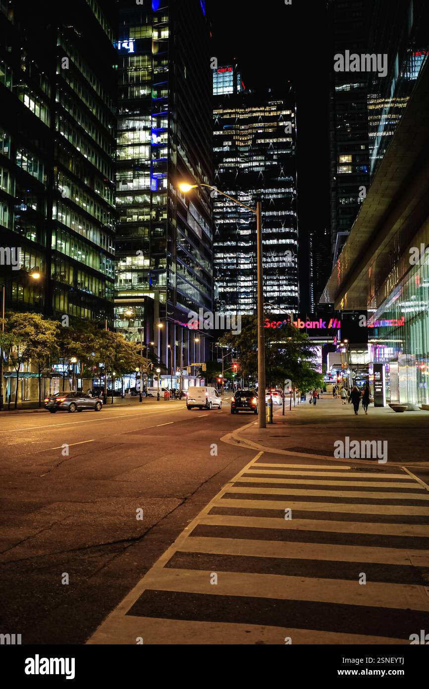 Urban streets of a night city life. Night City Street Building View ...