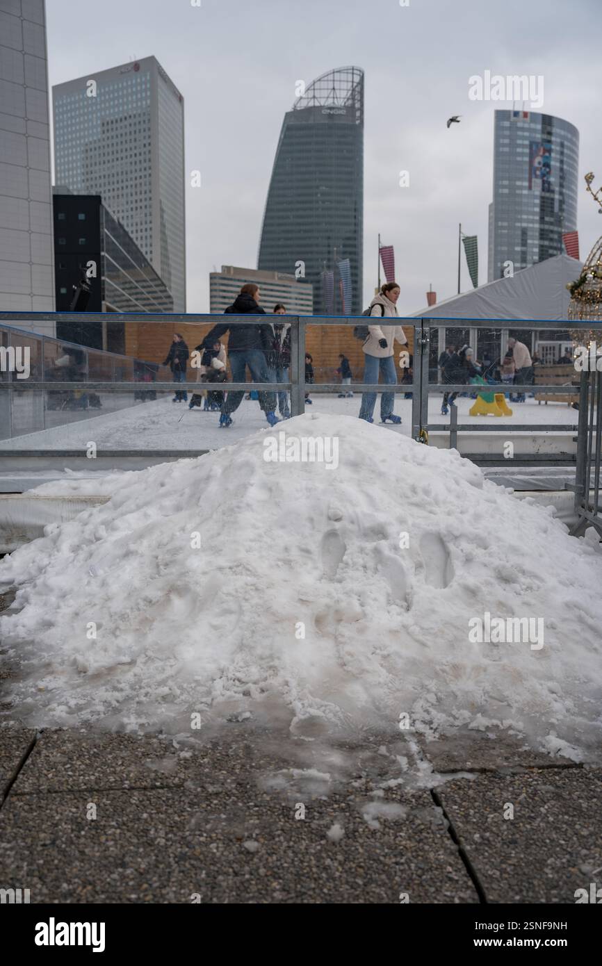 Snow mound created by a winter event in a bustling city center Stock ...