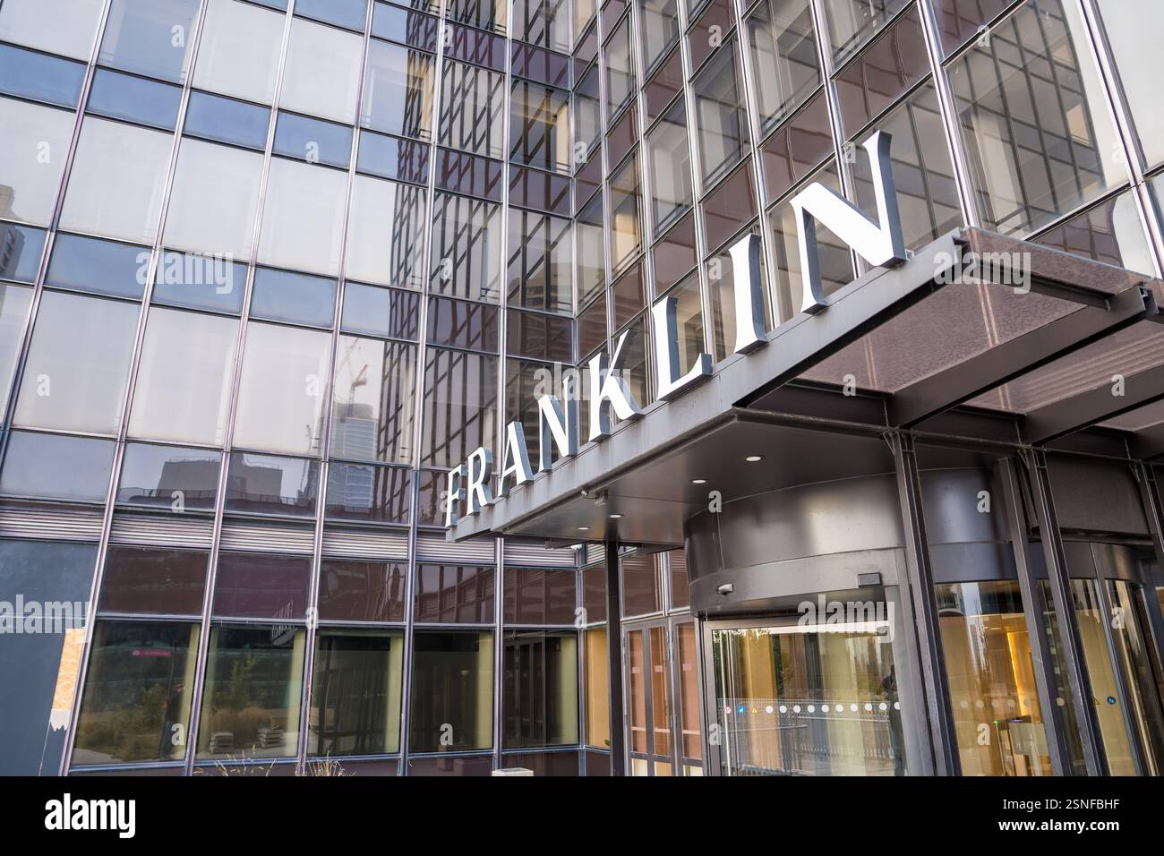 Modern architecture highlights the entrance of Franklin building at dusk Stock Photo - Alamy