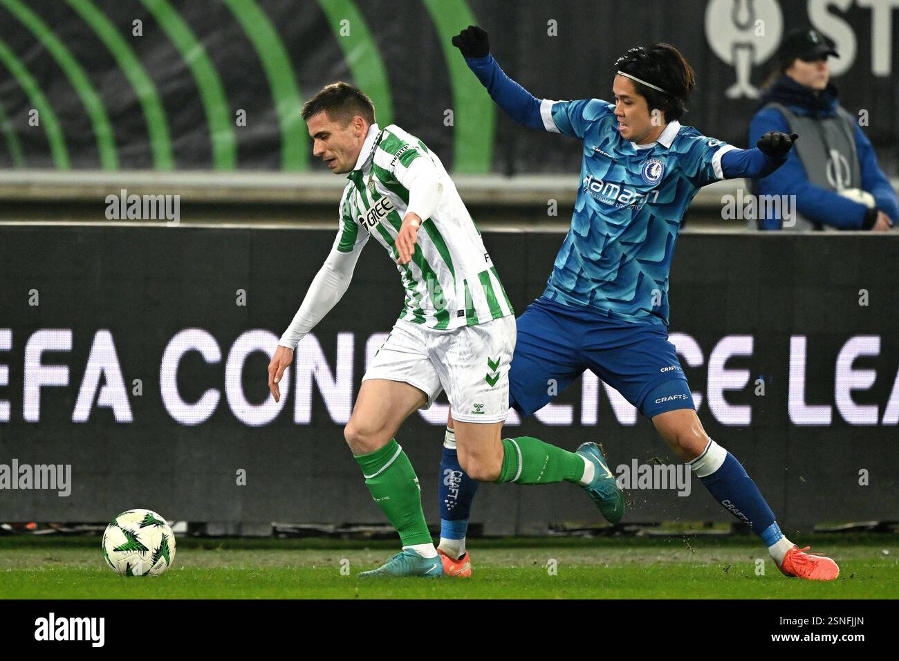 GENT - (l-r) Romain Perraud of Real Betis, Atsuki Ito of KAA Gent ...
