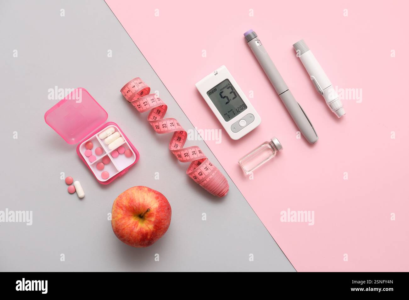 Modern glucometer with lancet pens, insulin ampule, measuring tape ...