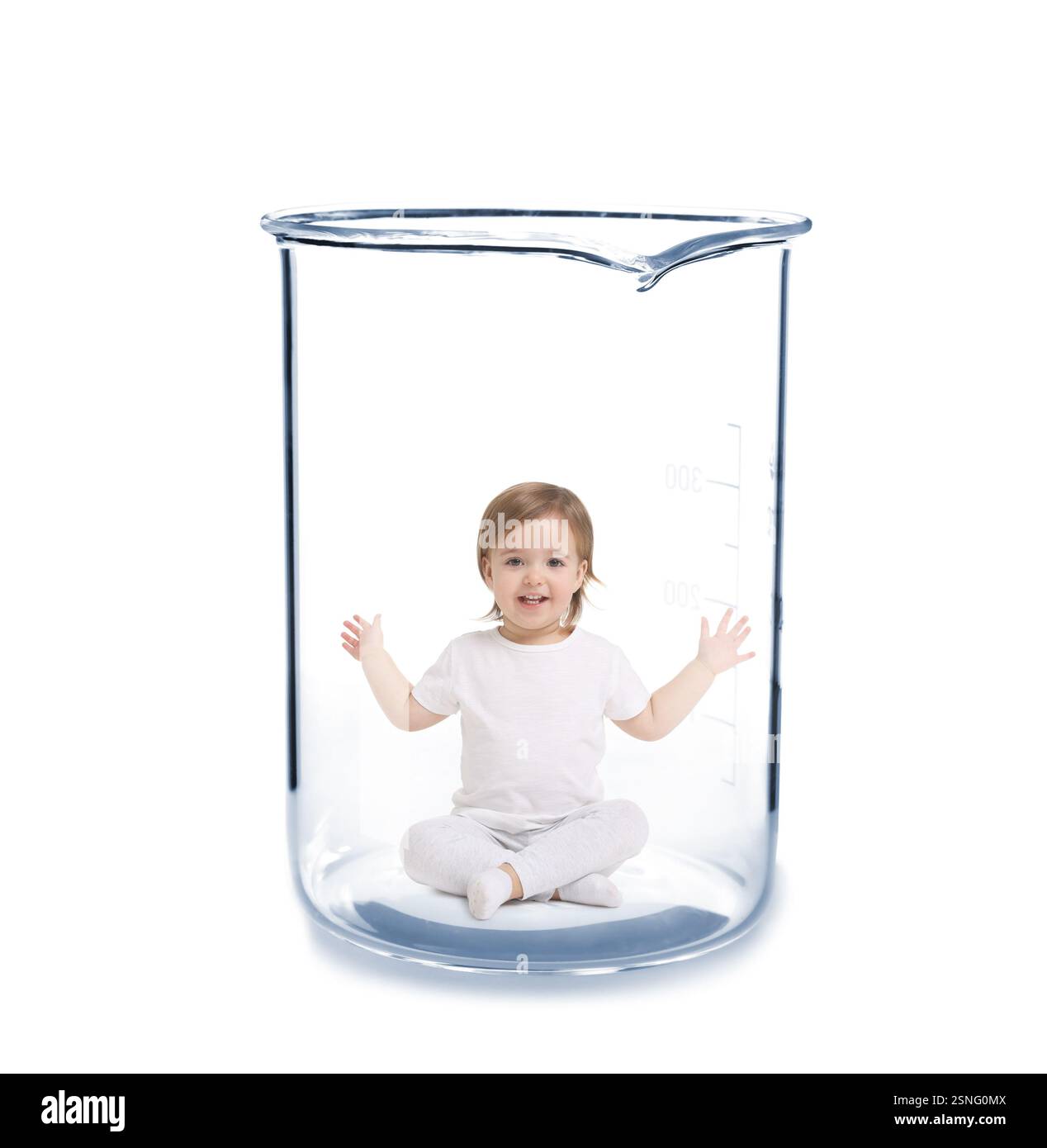Cute baby in glass beaker on white background. In vitro fertilisation ...