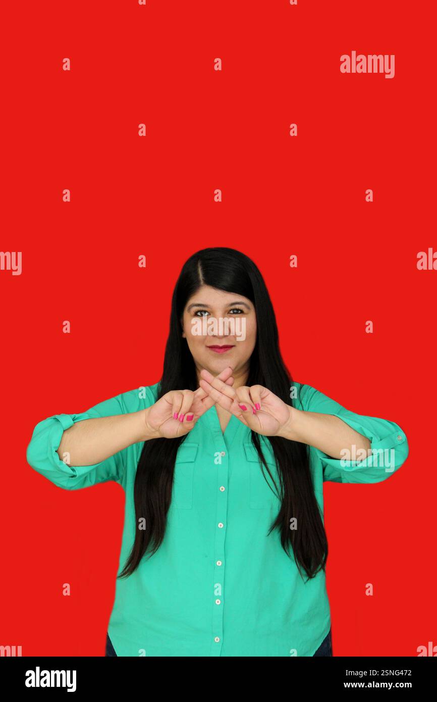 30-year-old Latina adult woman shows Mexican sign language used by deaf ...