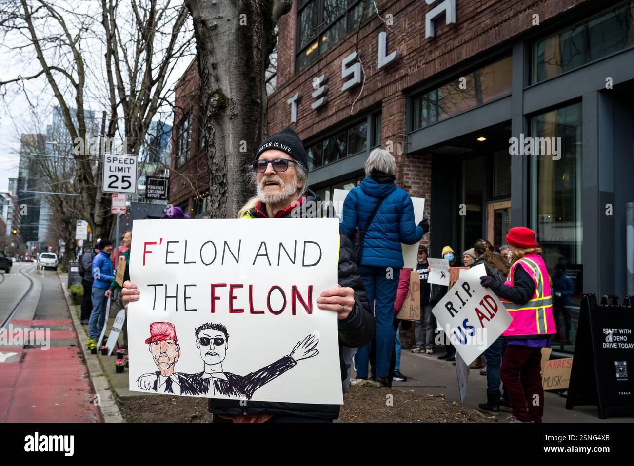 Seattle, USA. 13th Feb 2025. Activists gather at the Stop Musk To Save ...