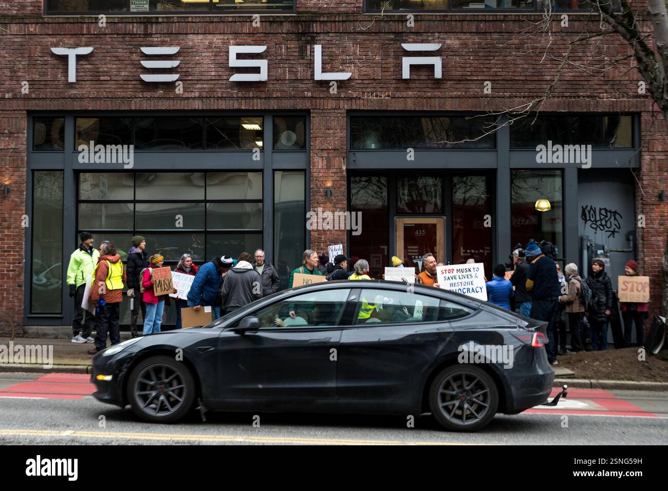 Seattle, USA. 13th Feb 2025. Activists gather at the Stop Musk To Save ...
