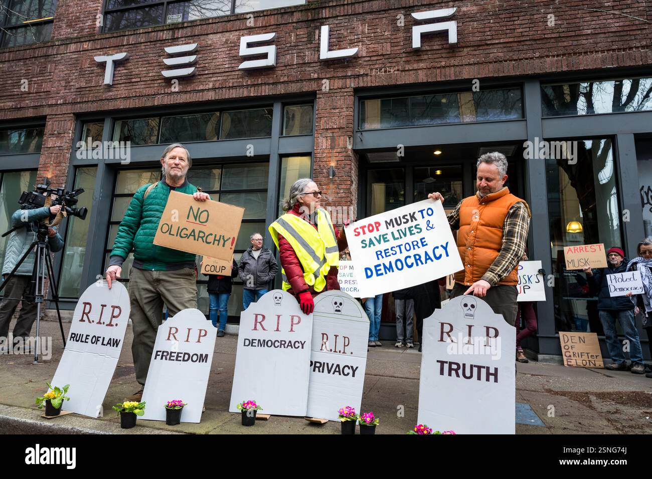 Seattle, USA. 13th Feb 2025. Activists gather at the Stop Musk To Save ...