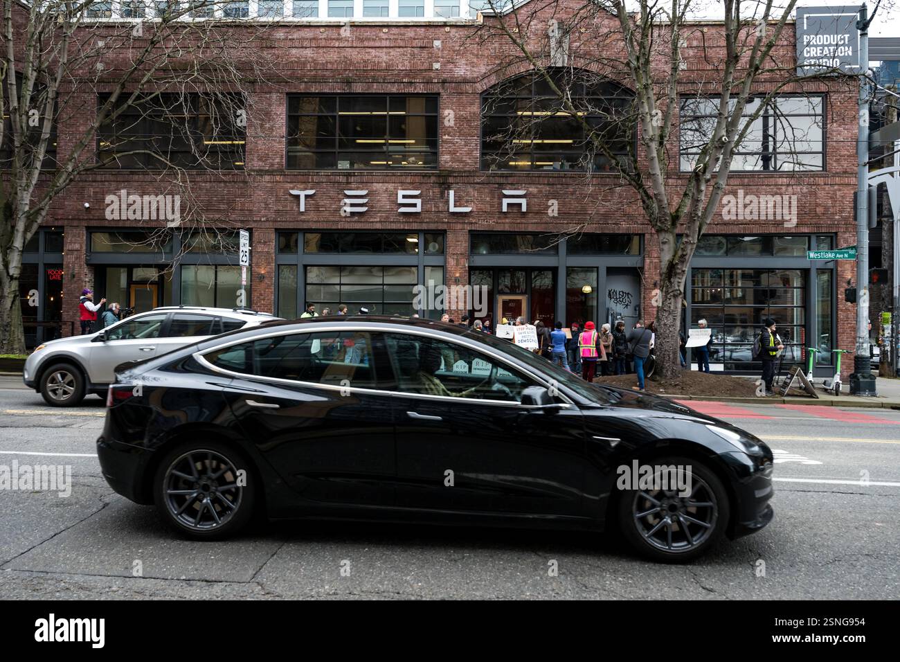Seattle, USA. 13th Feb 2025. Activists gather at the Stop Musk To Save ...