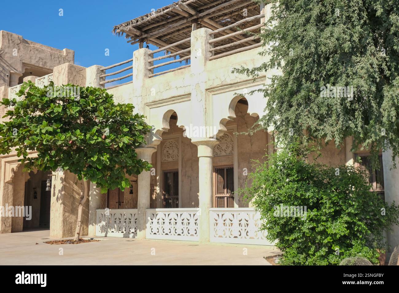 Traditional authentic Arabic mud brick sandstone house. Facade with ...