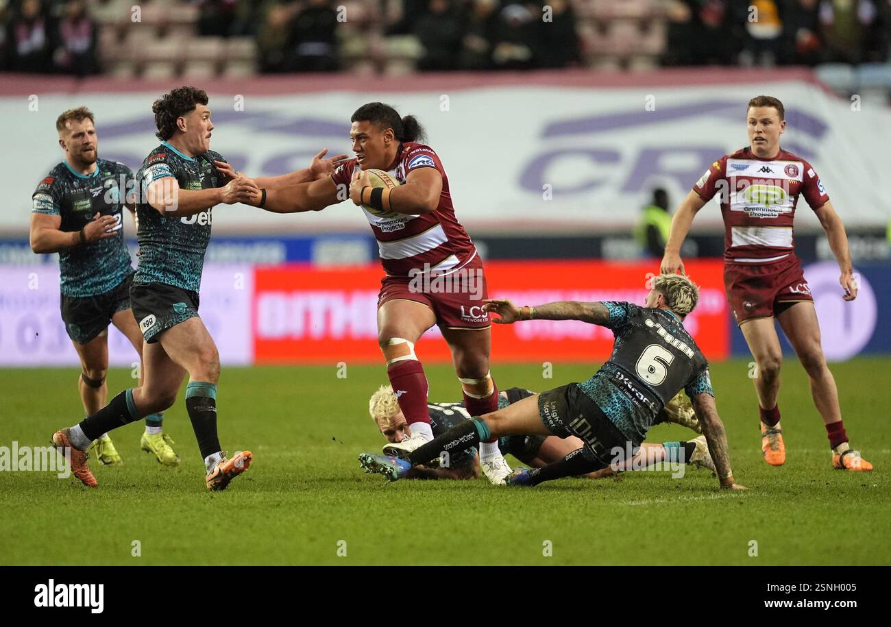 Wigan Warriors' Willie Isa in action with Leigh Leopards' Robbie ...