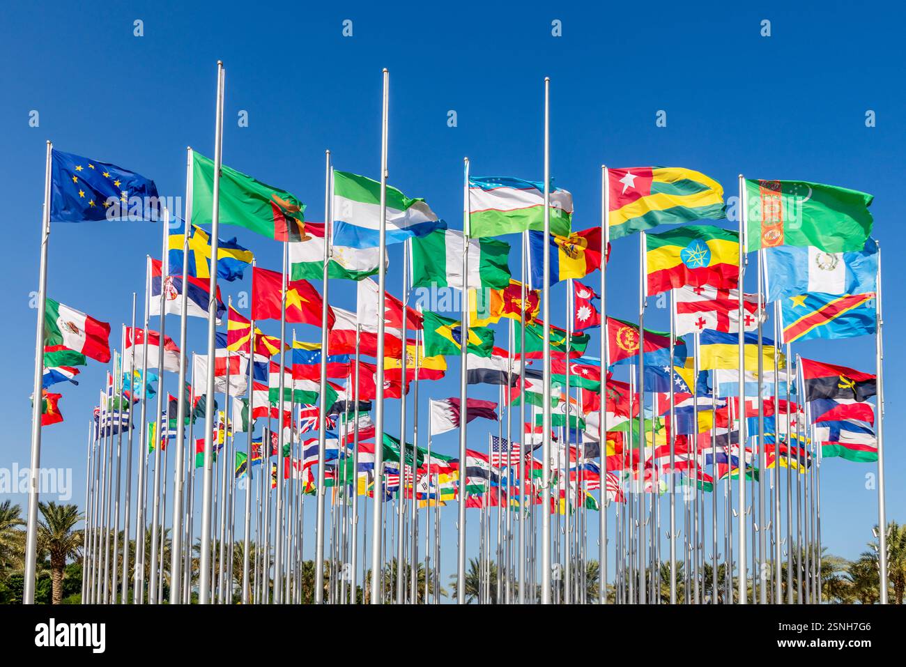 Many world's countries national flags waving on the wind, with European ...