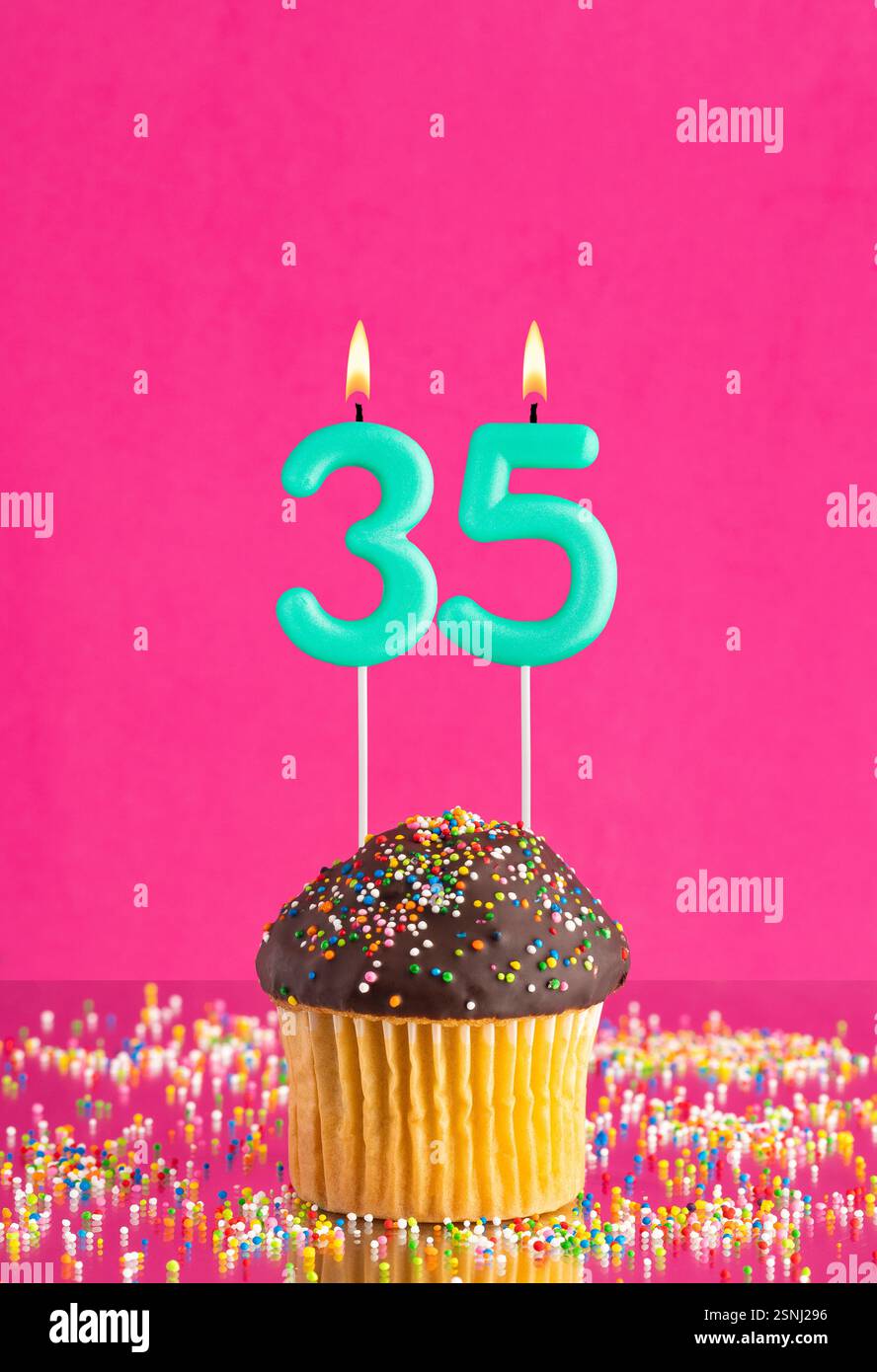 Birthday cupcake with number 35 candle - Celebration card on fuchsia ...