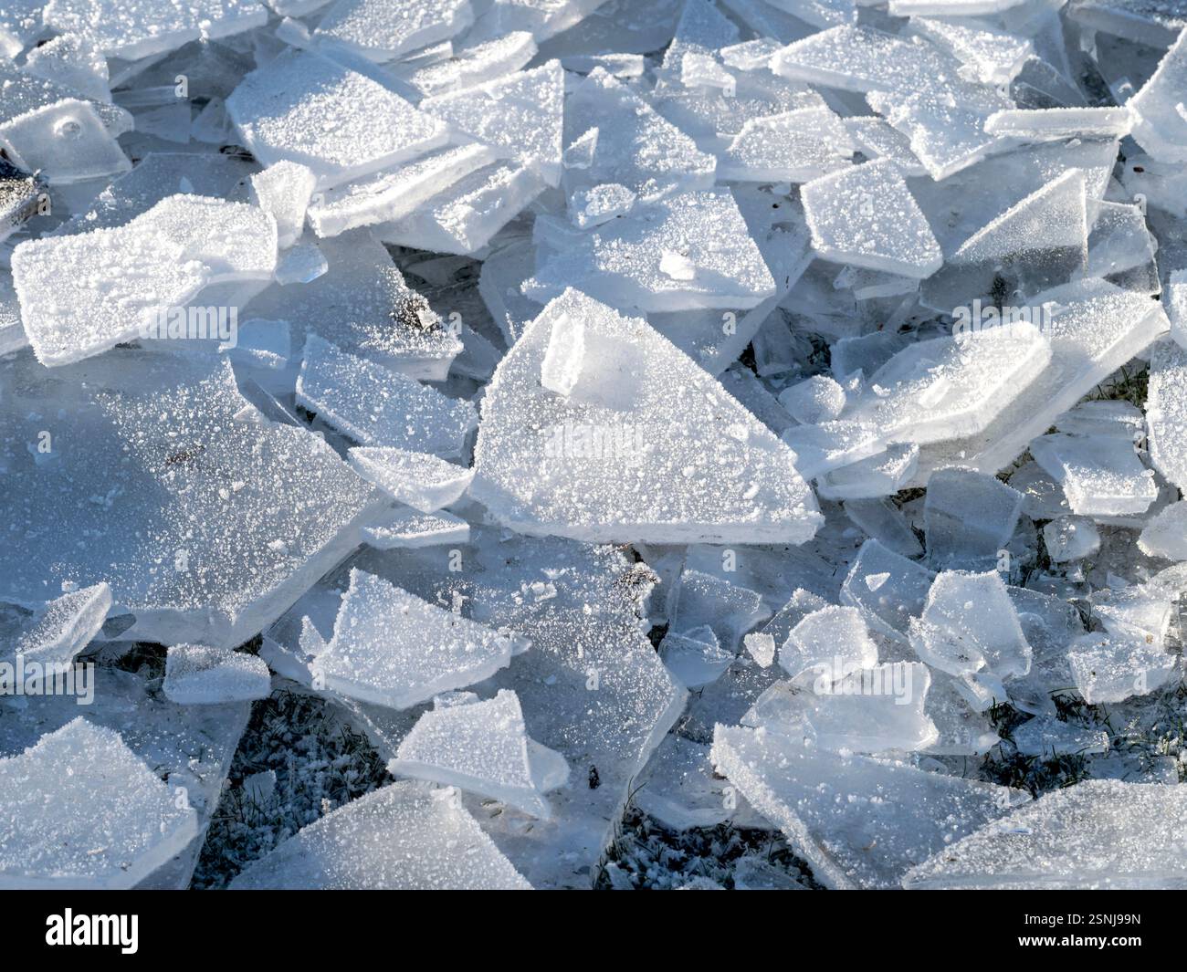 Broken blocks of ice with frost crystals Stock Photo - Alamy