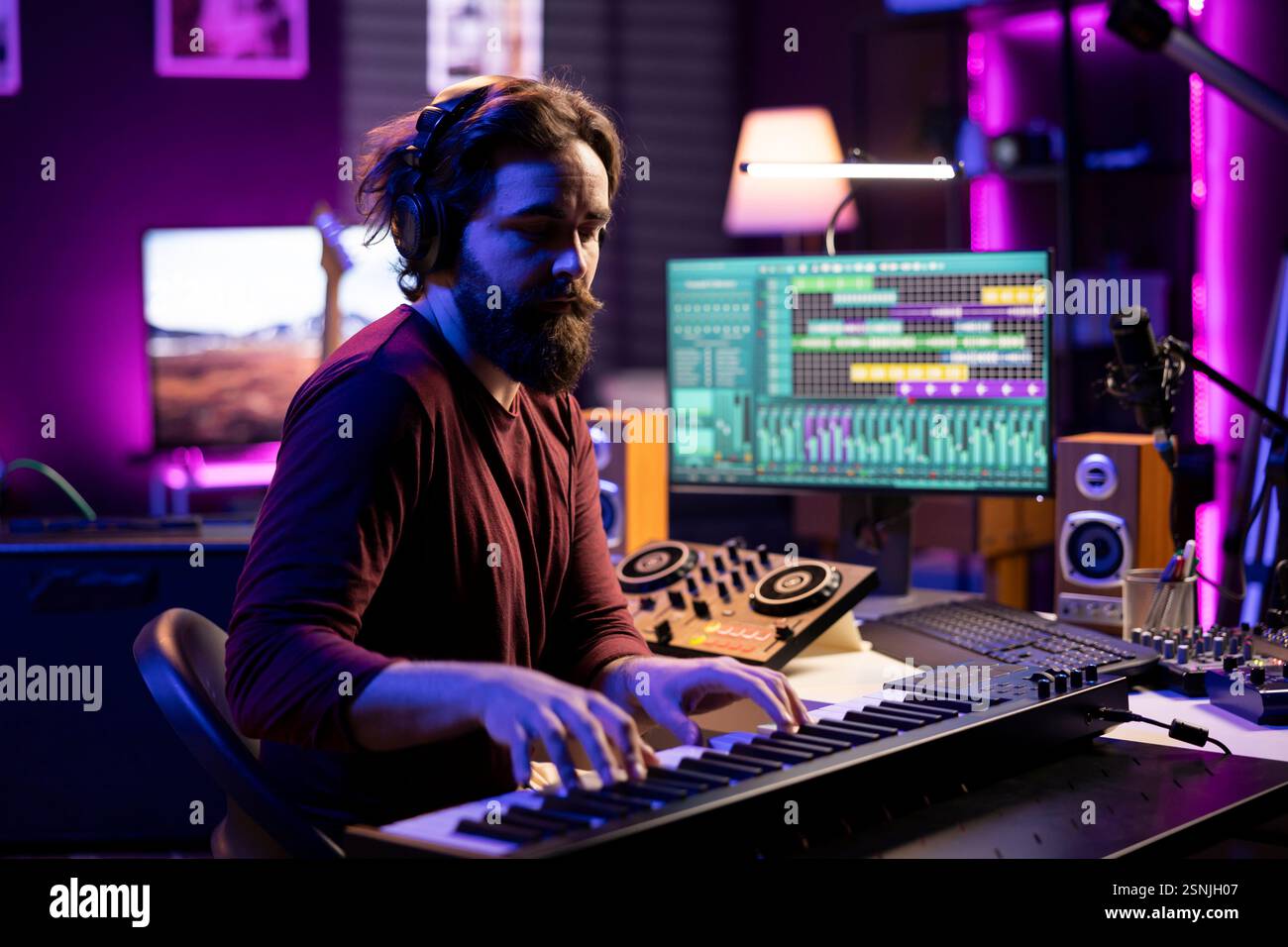 Skilled musician artist playing piano synthesizer notes for audio ...