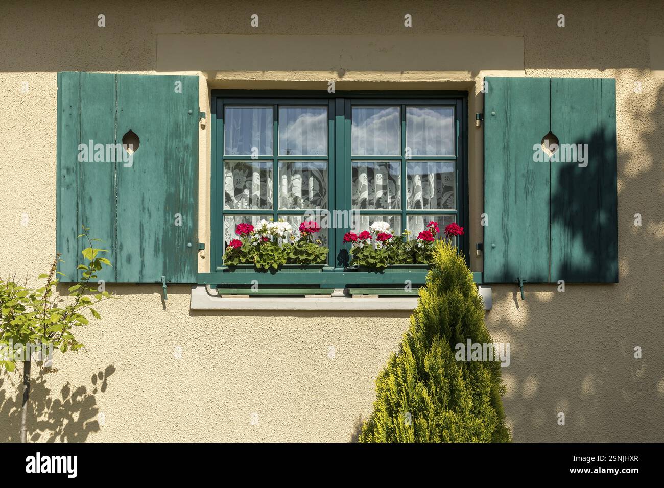 Windows with shutters in the small house neighbourhood Am gruenen ...