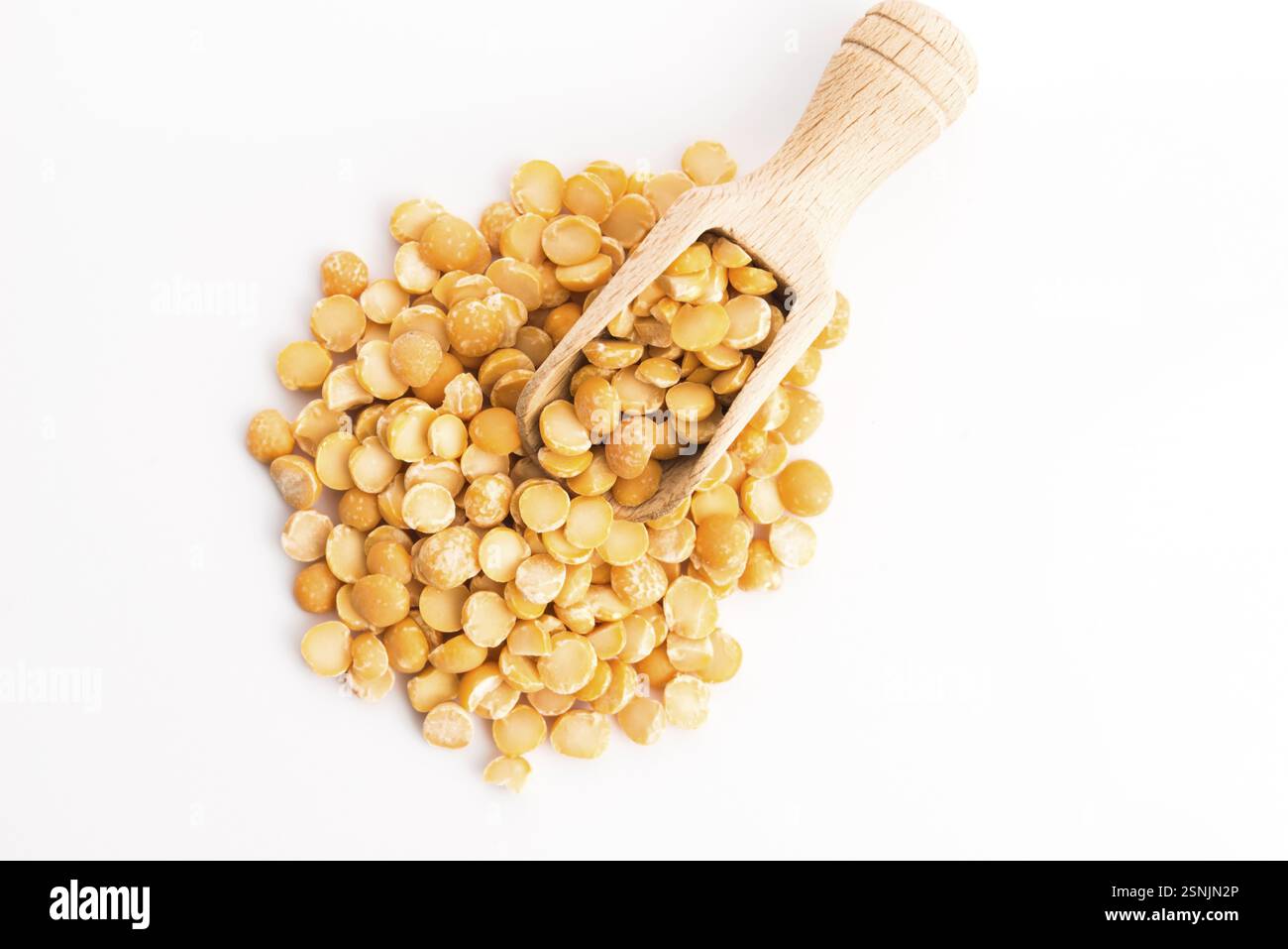 Yellow split peas isolated on white background Stock Photo - Alamy