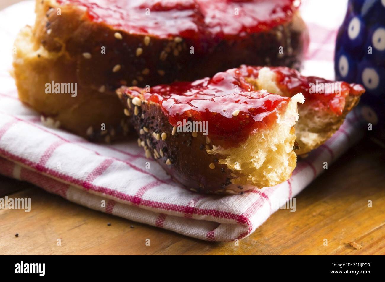 Sweet bread (challah) with strawberry jam, lodz, poland Stock Photo - Alamy