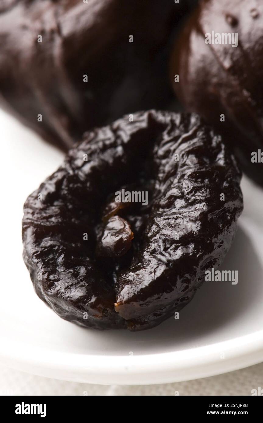 Dried plums in chocolate, lodz, poland Stock Photo - Alamy
