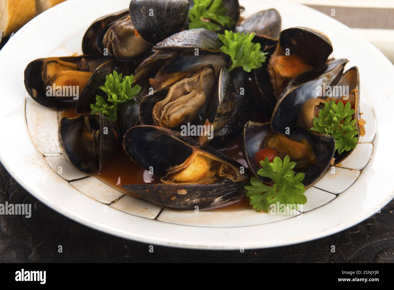 Clams in tomato sauce, lodz, poland Stock Photo - Alamy